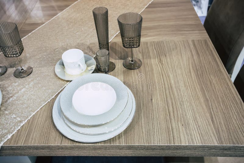 Elegant Table Appointments with Classic Plates and Retro Glasses Ready ...