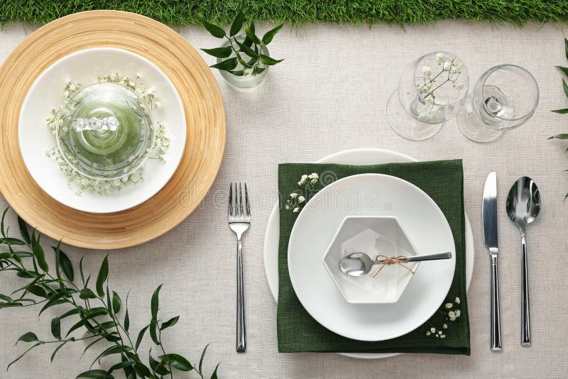 Elegant Table Setting with Green Plants on Light Cloth Stock Photo ...