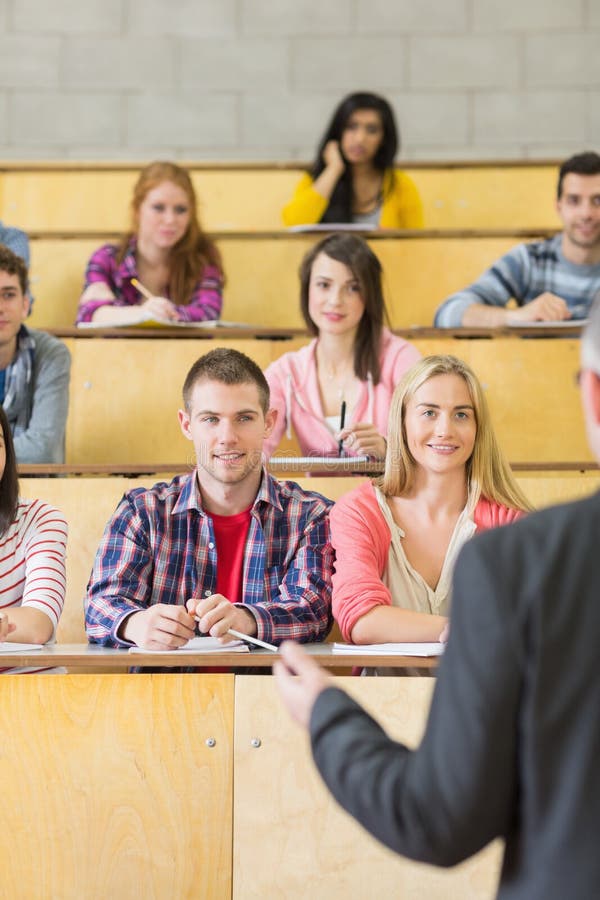 Elegant Teacher with Students at the Lecture Hall Stock Image - Image ...