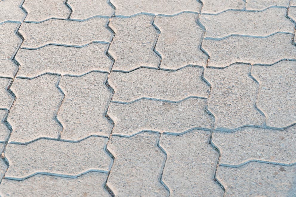 Elegant Texture of Interlocking Concrete Pavers in Soft Morning Light Stock Photo - Image of ...