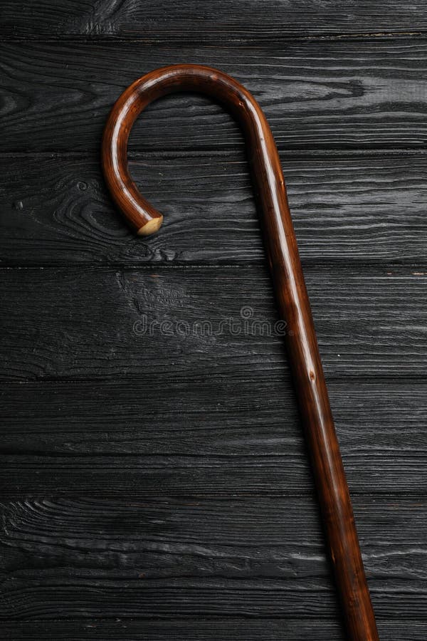Elegant Walking Cane on Black Wooden Table, Top View Stock Image ...