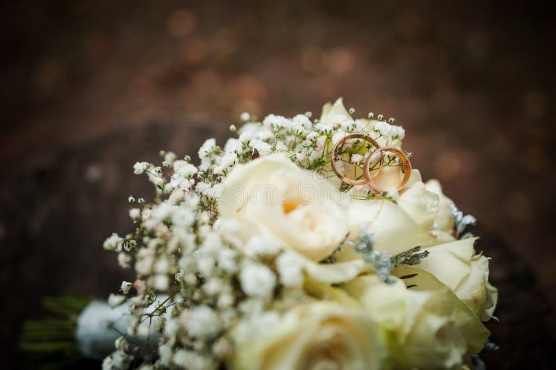 Elegant Wedding Bouquet with Roses and Wedding Rings Stock Image ...