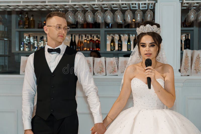 Elegant Wedding Moment: Bride and Groom& X27;s Speech at Celebration ...