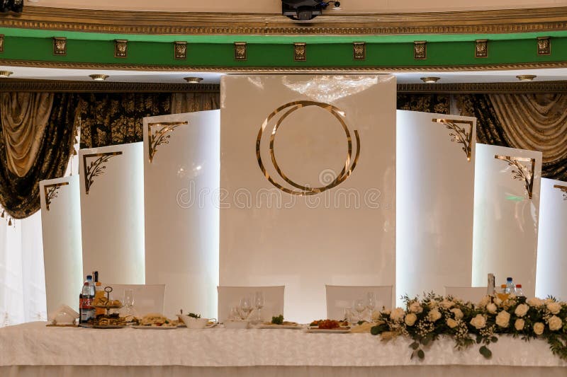 Elegant Wedding Reception with Decorative Backdrop and Table Setting ...