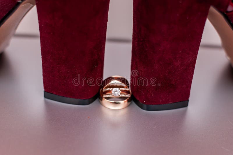 Elegant Wedding Ring Nestled between Velvet Heels Stock Image - Image ...