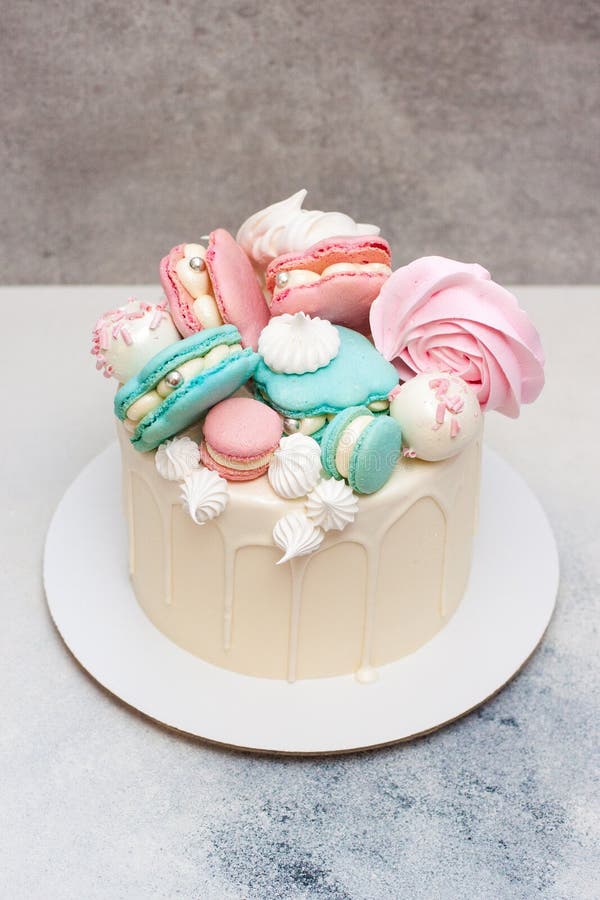 Elegant White Cake with Macaroon Sea Shells, Chocolate and Meringue ...
