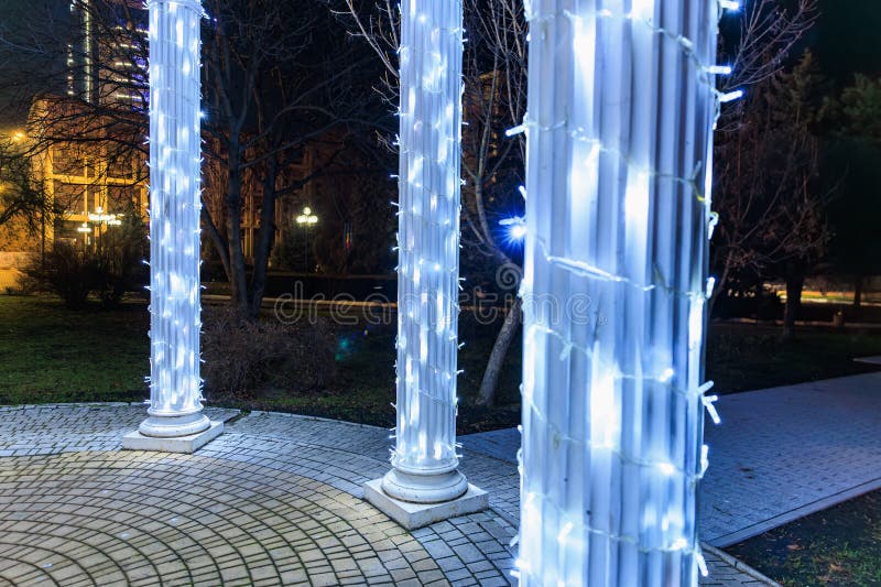 Elegant White Columns Wrapped in Twinkling Led Lights at Night Stock ...