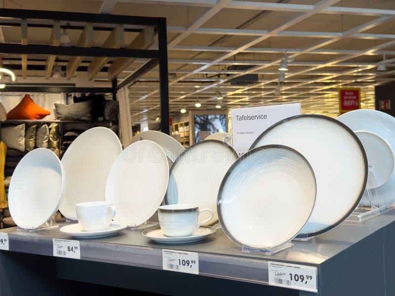 Elegant White Dinnerware Display in Retail Store Setting Editorial ...