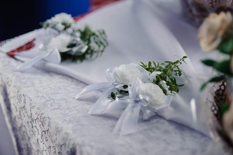 Elegant White Floral Corsages on a Delicate Table Setting Stock Photo ...
