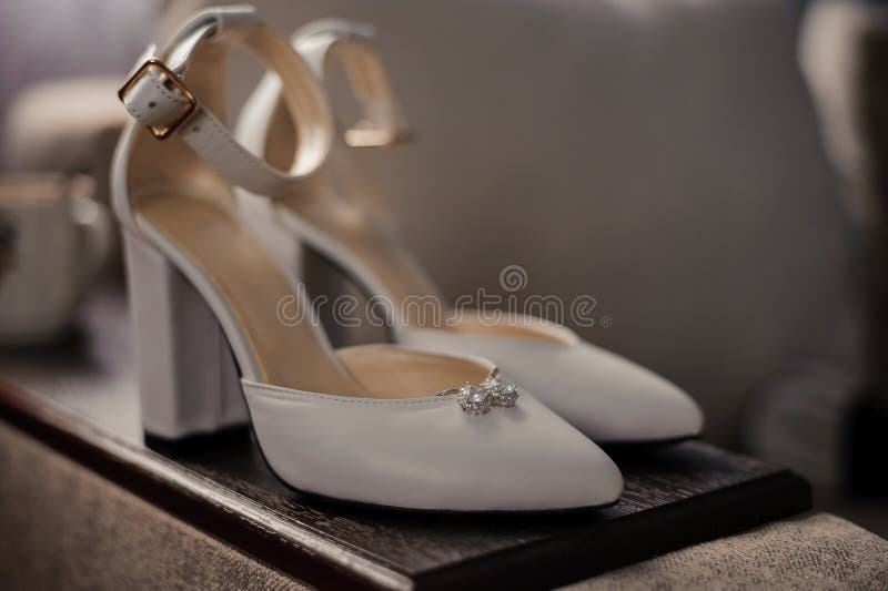 Elegant White High Heels with Rhinestone Detail on Display Stock Photo ...