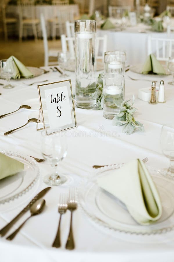 Elegant White Table Setting for a Wedding Reception with Pristine ...