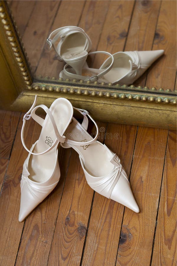 Elegant White Wedding Shoes in Natural Light Front of Mirror Stock ...