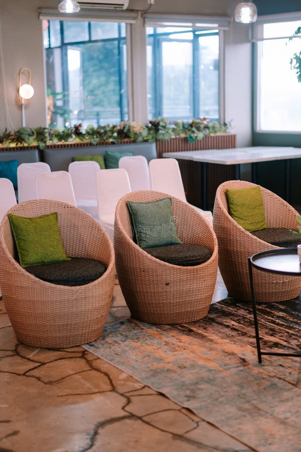 Elegant Wicker Chairs Create Inviting Seating Area in Modern Interior ...