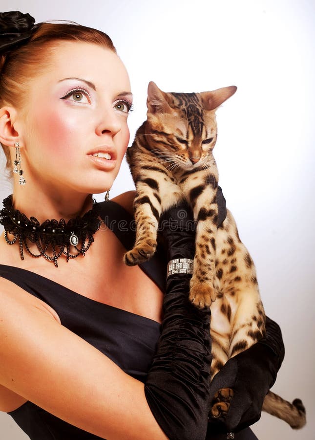 Elegant woman with cat stock photo. Image of care, fluffy - 74037412