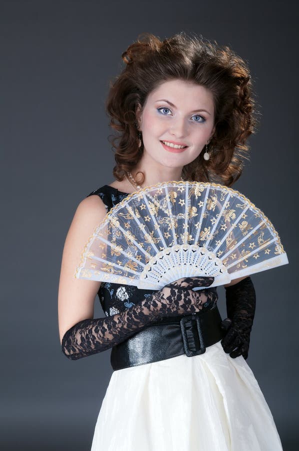 Elegant women with fan stock photo. Image of gown, glamour - 18049484