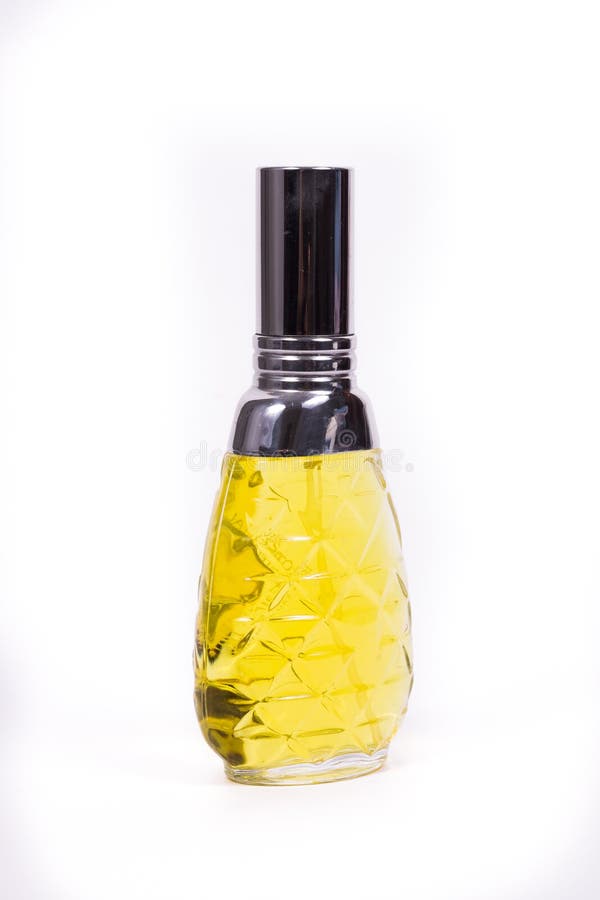 Yellow perfume bottle stock image. Image of container - 9907405