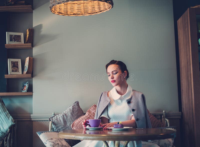 Elegant Young Lady Alone in a Cafe Stock Photo - Image of restaurant ...