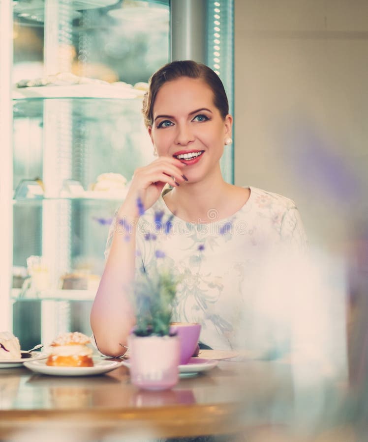 Elegant Young Lady Alone in a Cafe Stock Photo - Image of coffee ...