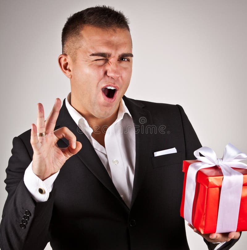 Elegant Young Man with Present Stock Image - Image of macho, object ...
