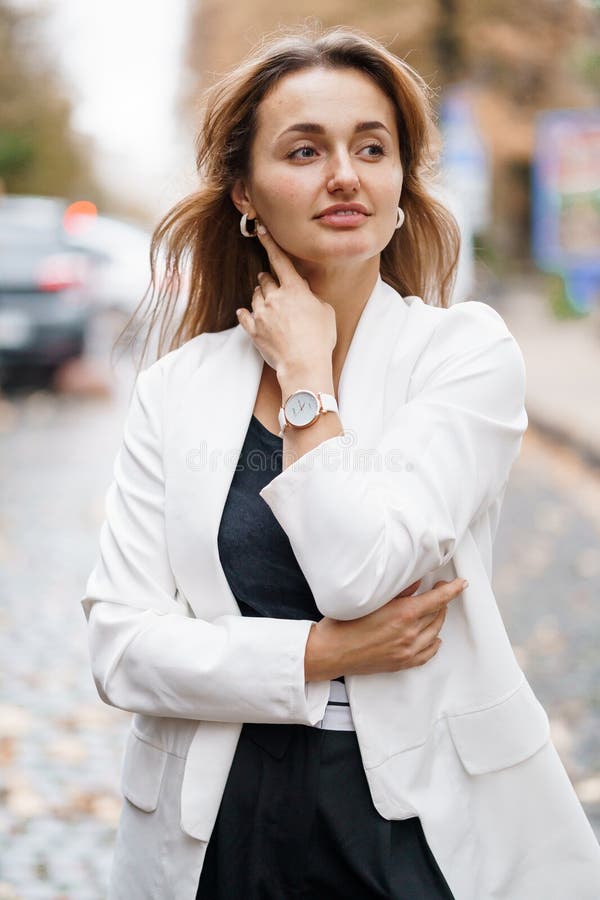 Elegant Young Woman in a Chic White Blazer in Urban Setting Stock Image ...
