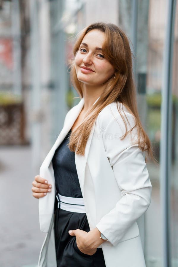 Elegant Young Woman Posing Outdoors in Chic Outfit Stock Image - Image ...