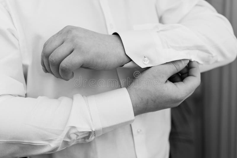 Elegantly Adjusting Cuff of a Formal White Shirt Stock Photo - Image of ...