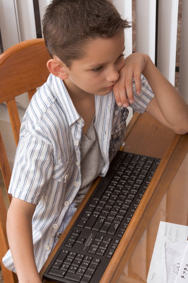 Elementary Age (8 Years) Kid Plays Computer Game Stock Image - Image of ...