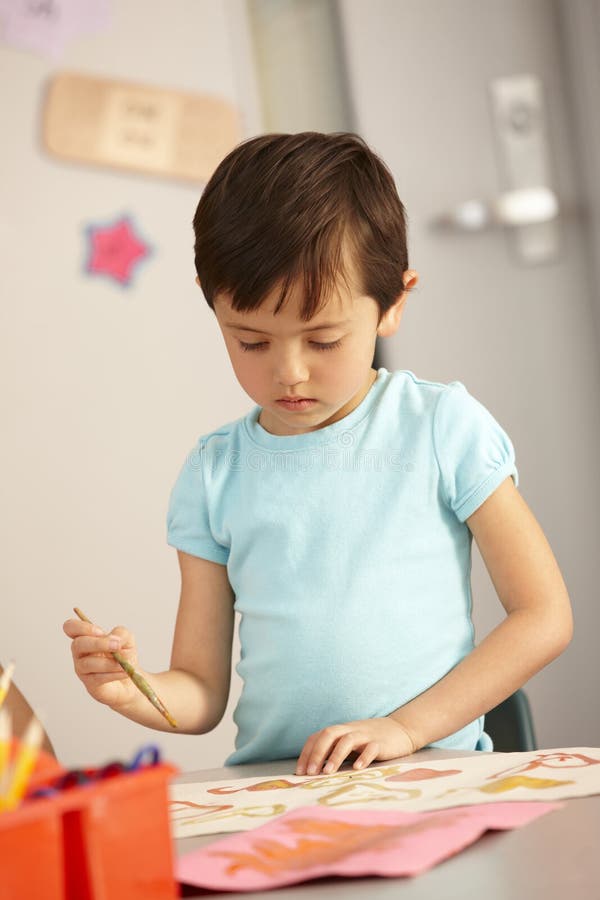 Elementary Age Schoolchild in Art Class Stock Photo - Image of ...