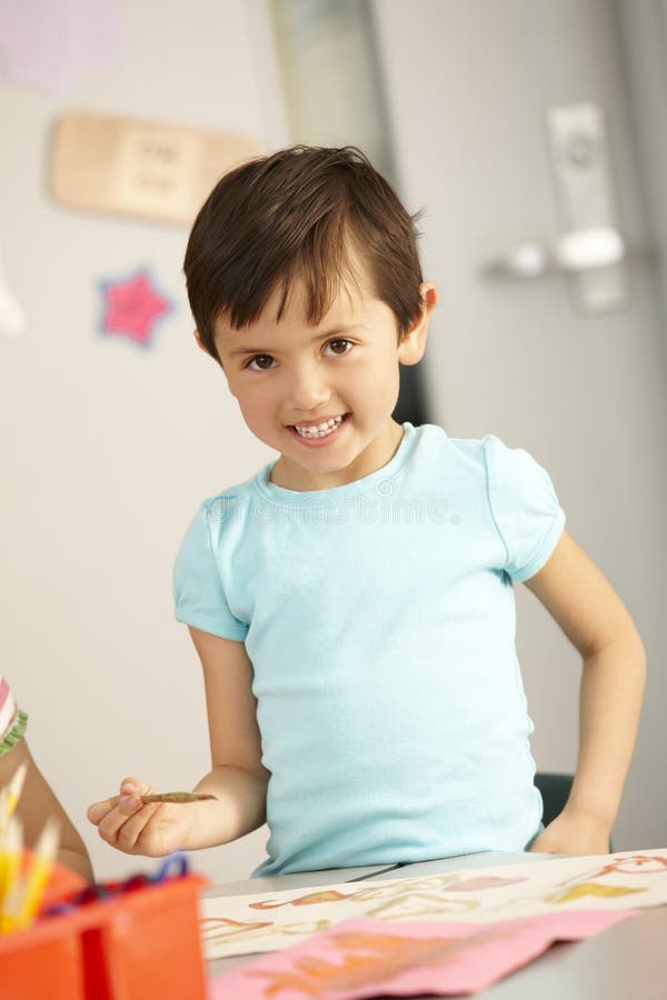 Elementary Age Schoolchild in Art Class Stock Photo - Image of ...