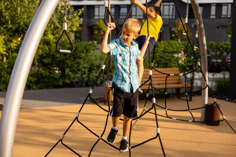 Elementary Aged Children in the Playground Stock Photo - Image of ...