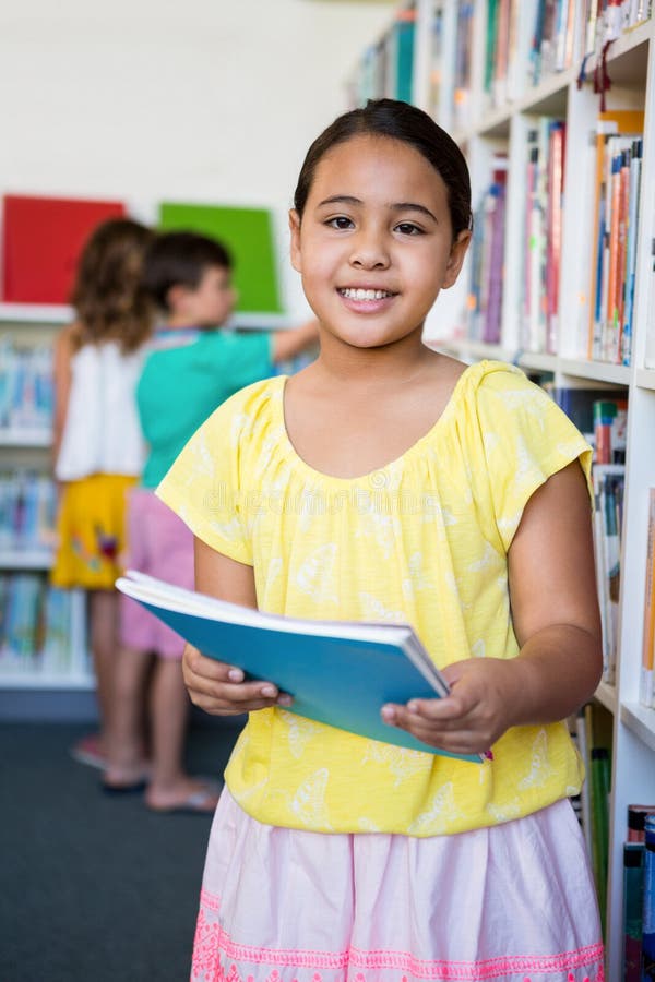 Front View Of Siblings Reading Book At Home Stock Image - Image of ...