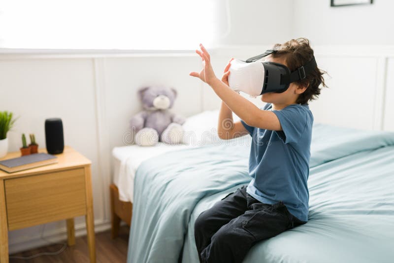 Elementary Kid Using a Virtual Reality Headset Stock Photo - Image of ...