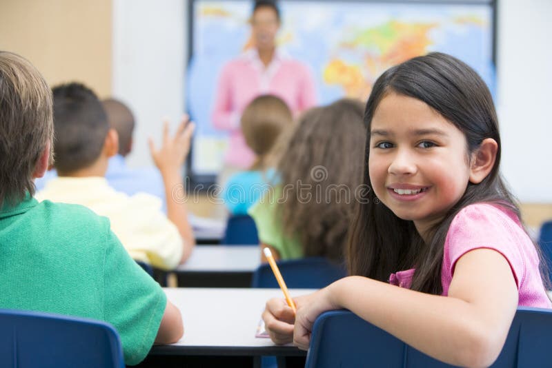 Elementary pupil in class stock image. Image of ethnicity - 5000605