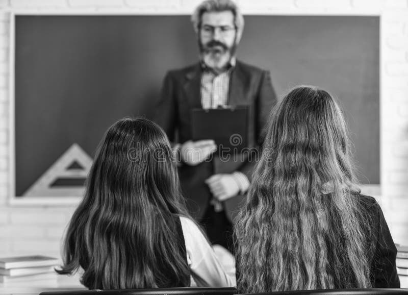 Elementary Pupil with Teacher in Classroom. Discussion Group of ...