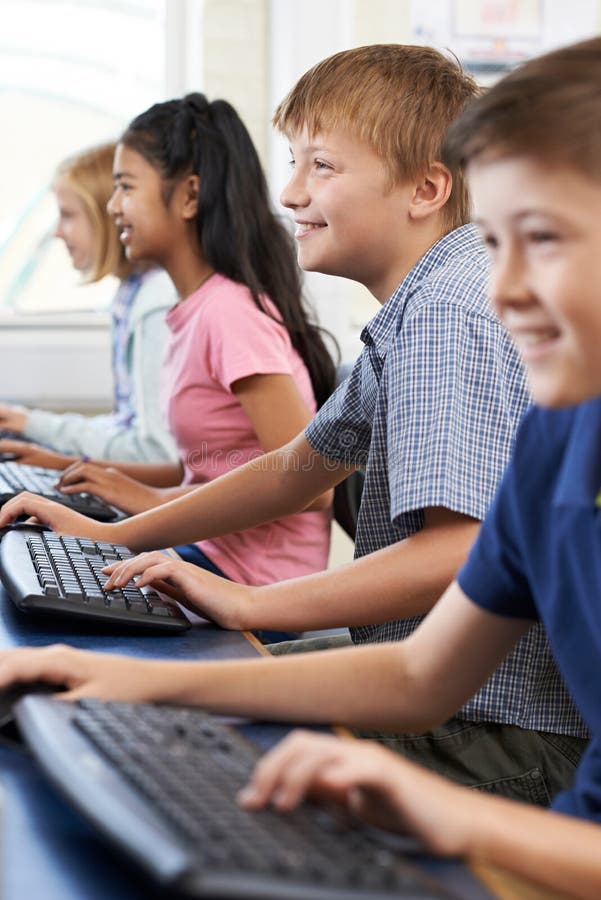 Elementary Pupils in Computer Class Stock Photo - Image of pupil ... Elementary Pupils in Computer Class Stock Photo - Image of pupil ...