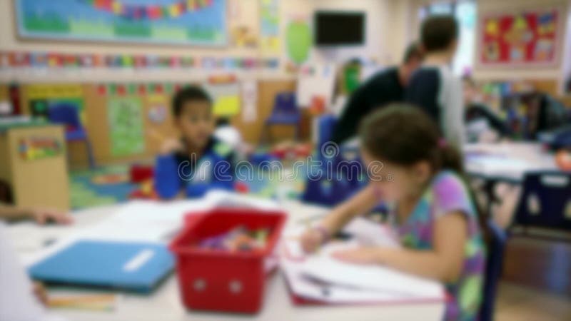 Elementary School-aged Children Working at Tables (4 of 4) Stock ...