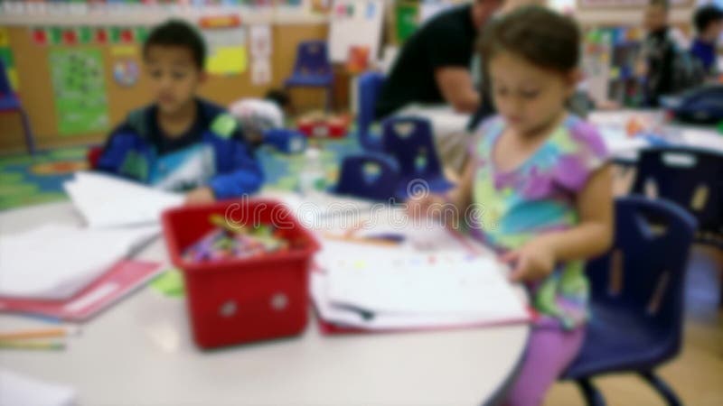 Elementary School-aged Children Working at Tables (4 of 4) Stock ...