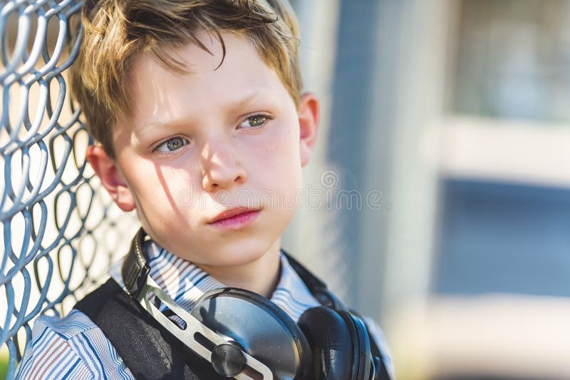 Elementary School Boy Outside Carrying a Backpack Stock Photo - Image ...