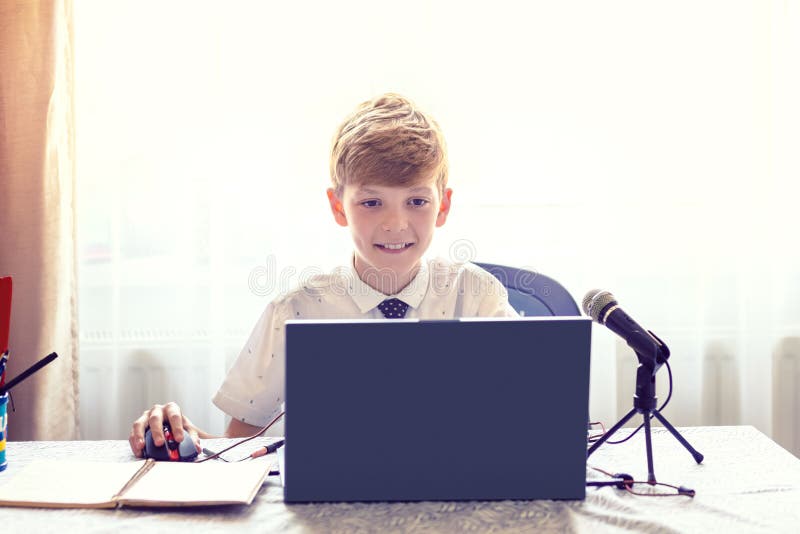 Elementary School Boy Studying from Home with Video Lesson Stock Image ...