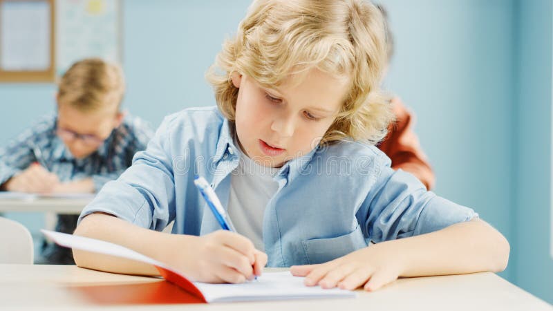 In Elementary School Class: Portrait of a Brilliant and Cute Caucasian ...