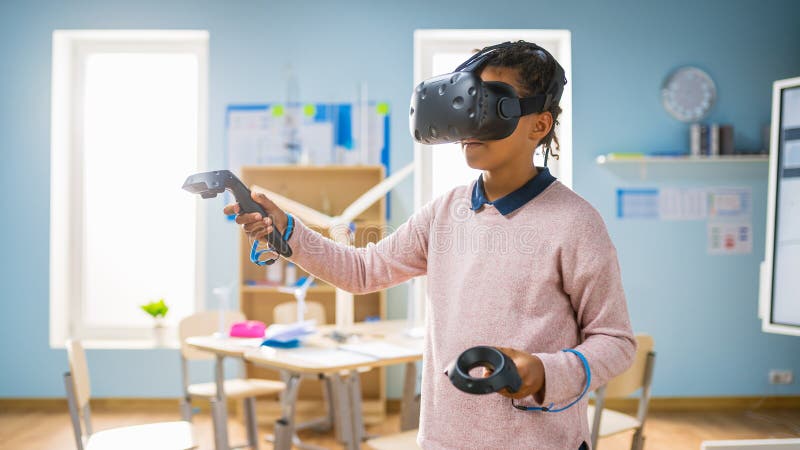 Elementary School Computer Science Class: Cute Girl Wearing Augmented ...