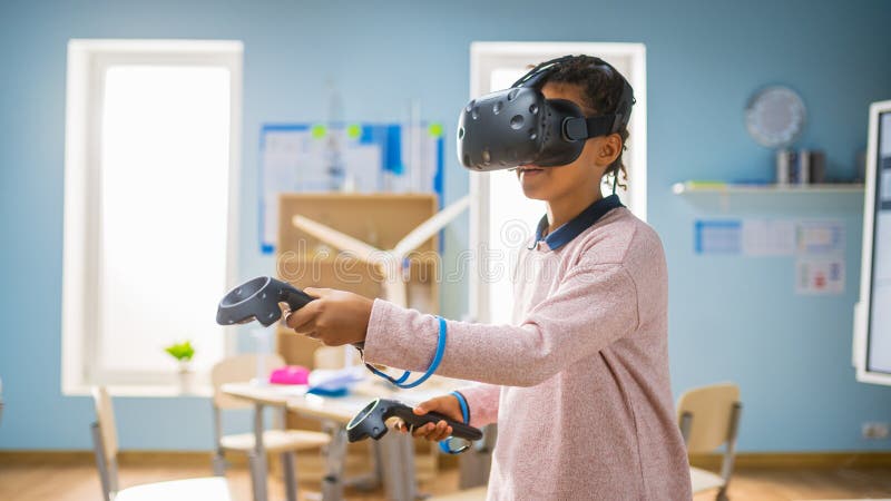 Elementary School Computer Science Class: Cute Girl Wearing Augmented ...