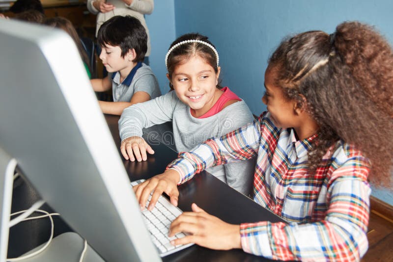 Girls Learn Together at the Computer Stock Image - Image of group ...