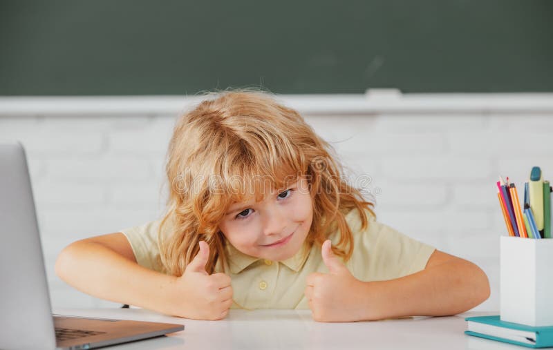 Elementary School Kid with Thumbs Up Working in Computer Class. Stock ...