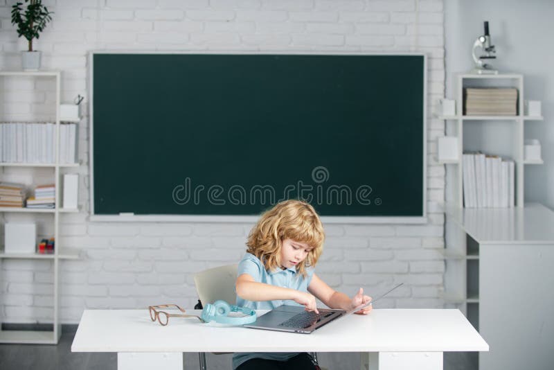 Elementary School Kid Working in Computer Class. Stock Photo - Image of ...