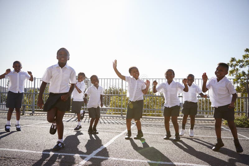 Elementary School Kids Having Fun in School Playground Stock Photo ...