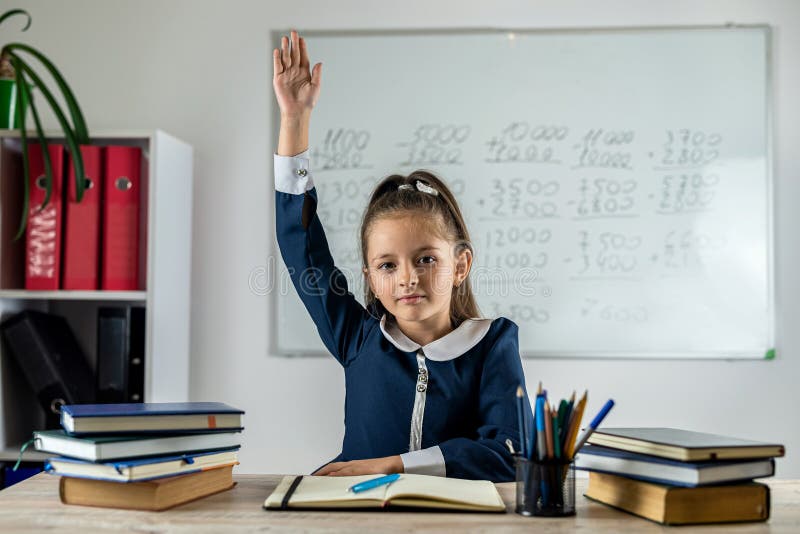 Elementary School Student Raises Her Hand because she is Ready Answer ...