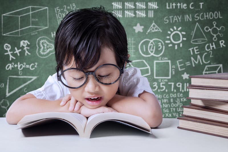 Elementary School Student Reads Textbooks in Class Stock Image - Image ...