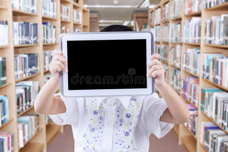 Elementary School Student with Tablet in Library Stock Photo - Image of ...