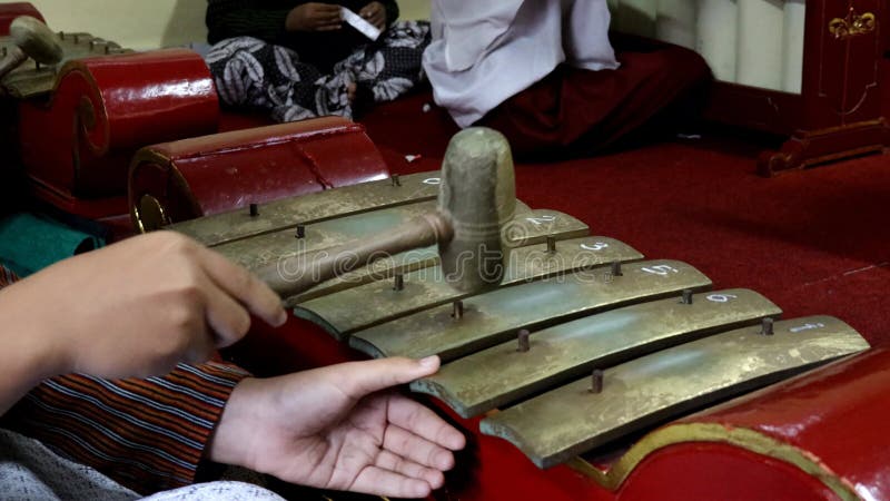 Elementary School Students Practice Playing Gamelan Musical Instruments ...